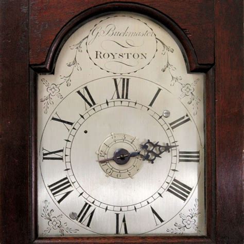 Very Small Hooded Wall Clock With Silvered Dial In A Mahogany Case By