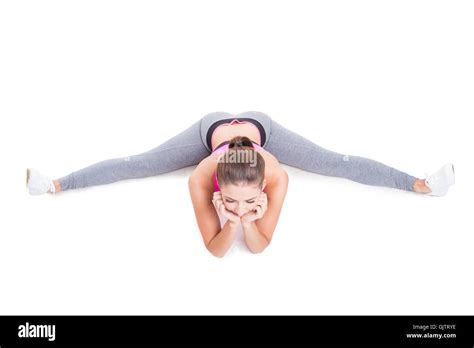 Up View Of Fit Girl Sitting With Leg Spread Isolated On White Background With Copy Text Space