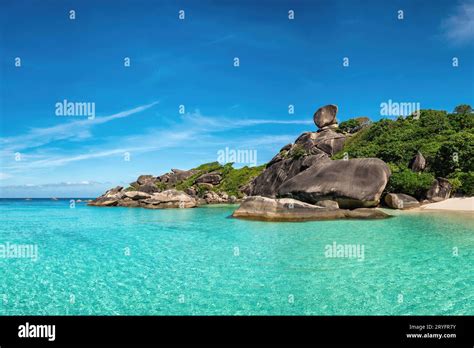 Tropical Islands Of Ocean Blue Sea Water And White Sand Beach At