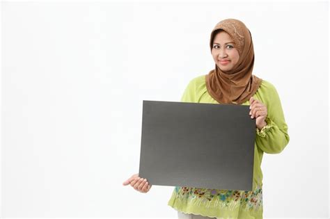 Premium Photo Portrait Of Mature Woman Holding Blank Placard While
