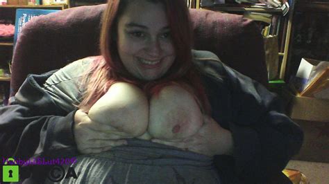 Chubby Ginger Babe Unveiling And Squeezing Her Big Boobs In A Solo