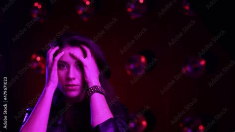 Female Model In Glowing Light Moving Like Striking A Pose Happy Girl Having Fun In Club