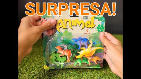 KIT DE DINOSSAUROS SURPRESA UNBOXING DINOSSAURO DO DINO TRUCK PLAY