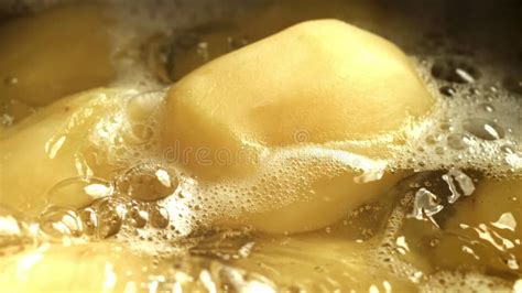 Peeled Potatoes In Boiling Water Filmed On A High Speed Camera At 1000