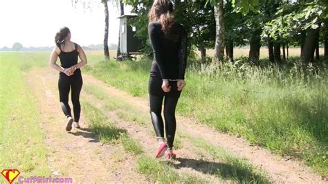 Handcuffed And Leg Ironed Friends At Their Walk In The Summer Nice Leggings By The Way Sexy