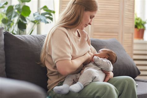 Woman Breastfeeding Telegraph