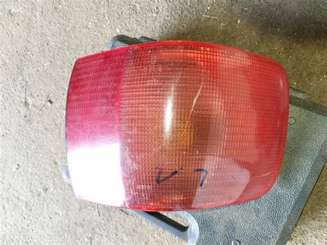 LAMPA TYLNA LEWA W BŁOTNIKU AUDI 80 B4 SEDAN 7883314735 oficjalne