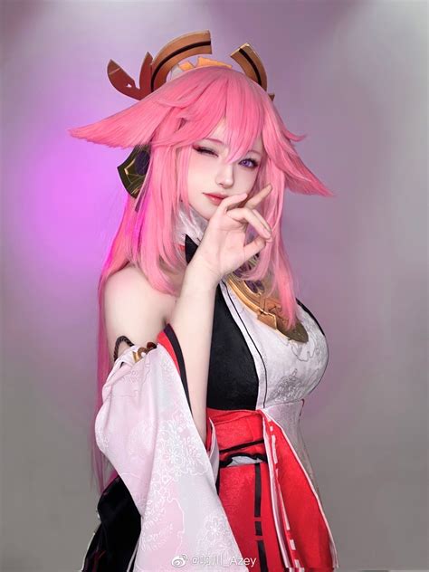 Genshin Impact Cosplay cáo hồng Yae Miko và Lôi Thần Ei