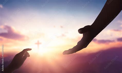 Religion And Salvation Concept God Reaching Out To Help People On Cross