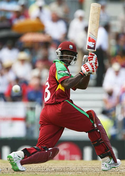 Simon Taufel Raises His Arms To Signal Another Six Off Liam Plunkett S