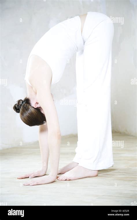 Woman Bending Over Touching Toes Full Length Stock Photo Alamy
