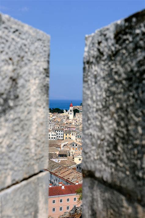 Venetian Buildings Of Corfu Viewed Through The Battlements Of The New