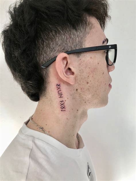 Atreus Neck Tattoo Lettering On His Neck Translates Into The Icelandic