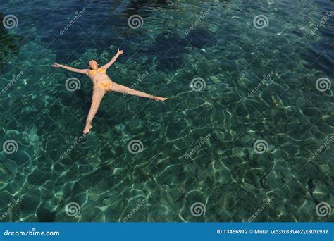 Woman Floating In Sea Stock Photo Image Of Down Floating