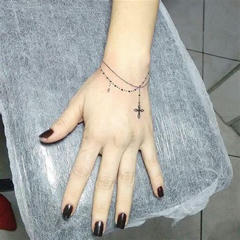 Cross Tattoo On Hand Small Cross Tattoos Small Hand Tattoos Tiny