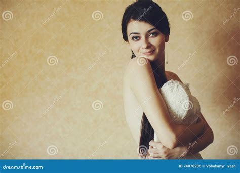 Naked Bride Tries A Wedding Dress Stock Photo Image Of Bridesmaid
