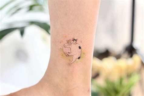 Small Cat Tattoo Ideas That Will Blow Your Mind