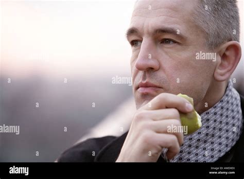Man Eating Apple Stock Photo Alamy