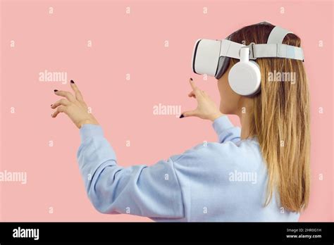 Girl In Innovative Headset Playing Video Game Experiencing Vr