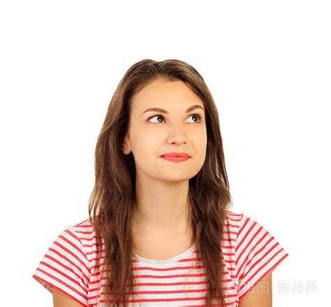 美丽体贴的女人向上看在白色背景下被隔绝的情感女孩照片 正版商用图片05yoko 摄图新视界
