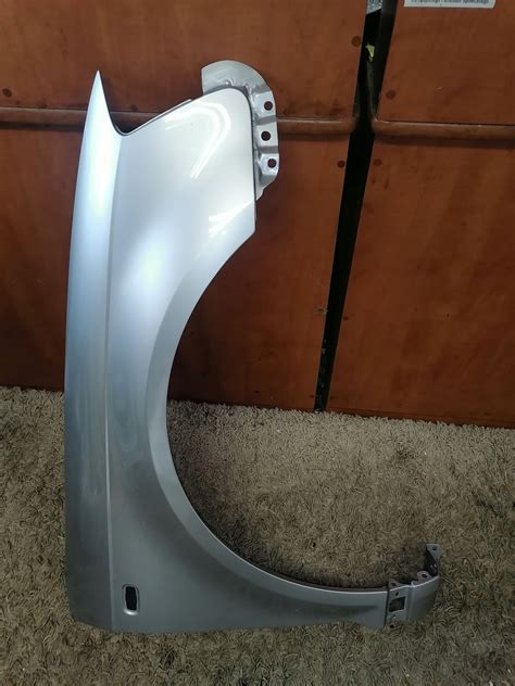 BŁOTNIK PRAWY PRZÓD AUDI A3 8P PRZEDLIFT LX7W 321321 za 580 zł z Radom