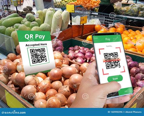 Hand Holding Smartphone To Scan QR Code Payment Online Shopping