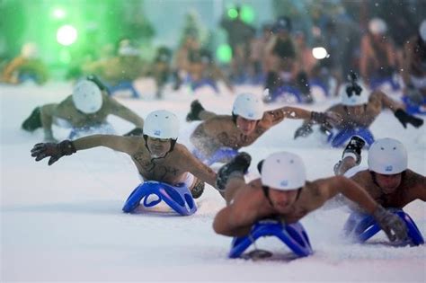 Naked Snow Sledding Race