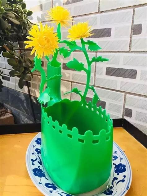 废旧塑料瓶子制作花盆 旧塑料瓶手工制作花盆 洗衣液花盆制作大全 大山谷图库