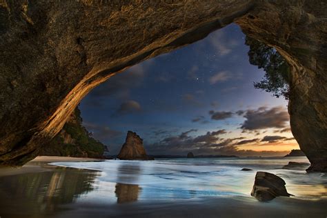 Serene Night At The Cave An HD Wallpaper Experience