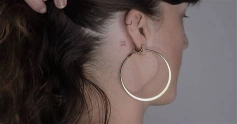 Minimalistic Style Gemini Zodiac Symbol Tattooed Behind
