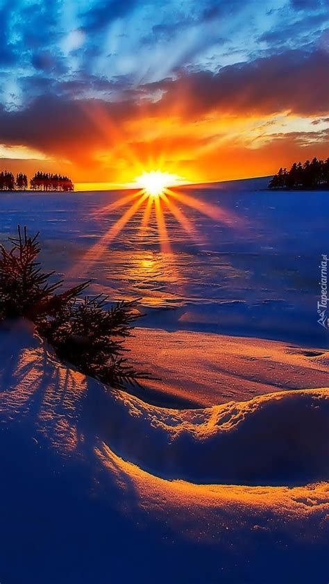 Zachód słońca zimą w oddali Tapeta na telefon Beautiful scenery