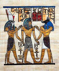 Two Egyptian Men And One Is Wearing An Egyptian Headdress While Another