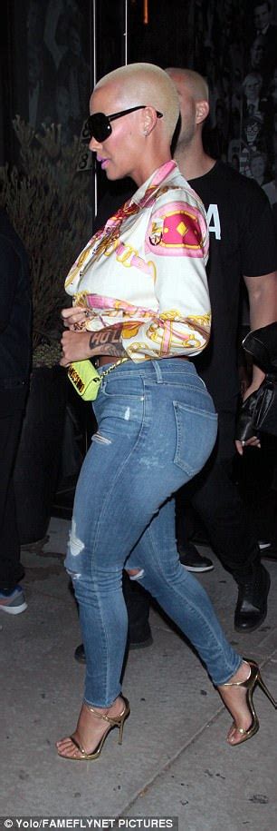 Amber Rose S Jeans Struggle To Contain Her Famed Assets Daily Mail Online