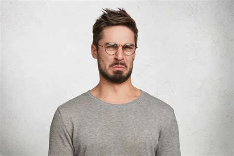 Negative Human Expressions And Attitude Angry Dissatisfied Male Has Disgusting Expression As