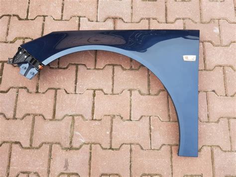Błotnik przód przedni lewy Opel Astra K Z176 IGŁA
