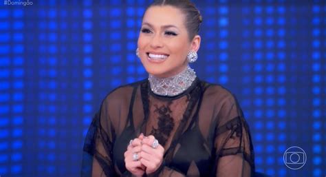 Lívia Andrade aposta em look preto transparência e cita inspiração