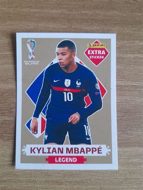 Figurinha Extra Kylian Mbappe Gold Ouro Copa Legend Roupa