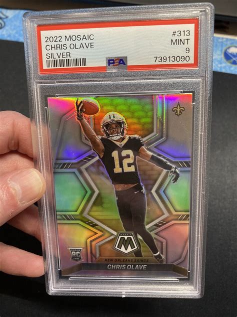 2022 Panini Mosaic Rookies Silver Prizm 313 Chris Olave RC For