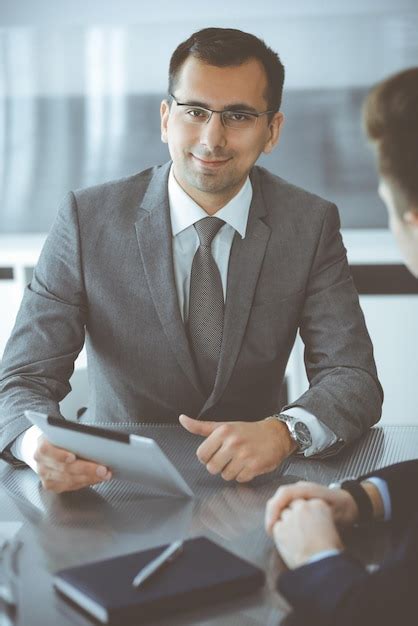 Premium Photo Businessman Headshot At Meeting In Modern Office