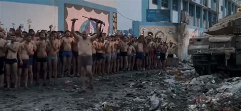 Moment Shirtless Hamas Fighters Lay Down Their Guns Put Their Hands