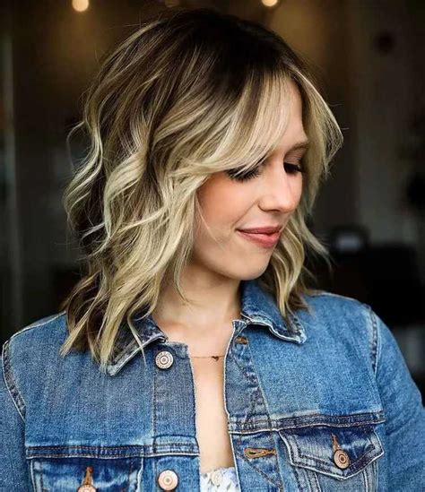 Women S Hairstyles 2023 We Love The Layered Curtain Bangs That