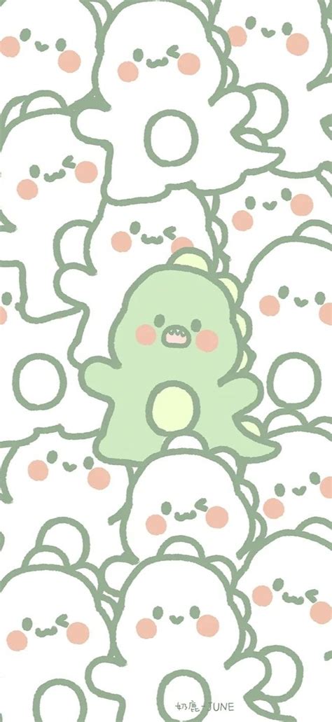 A Bunch Of Small Green And White Teddy Bears With Pink Noses On Their