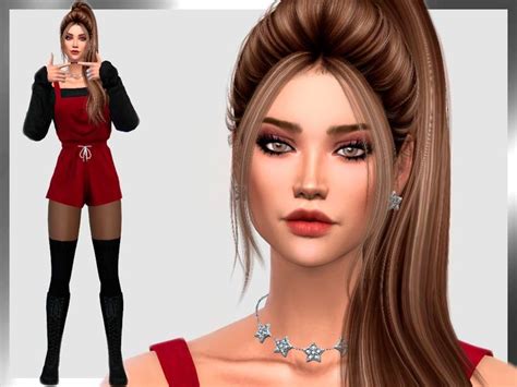 A Woman With Long Brown Hair Wearing A Red Dress