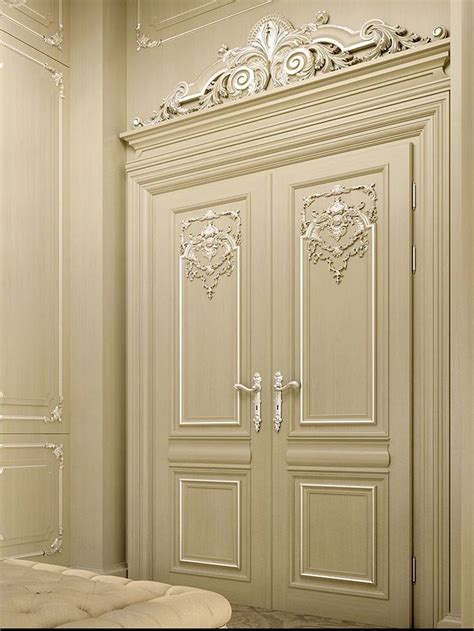 An Ornately Decorated Room With Two Double Doors