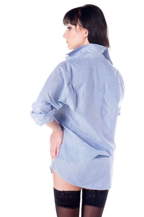 Belle Fille à Moitié Nue Dans La Chemise Et Les Bas Image stock