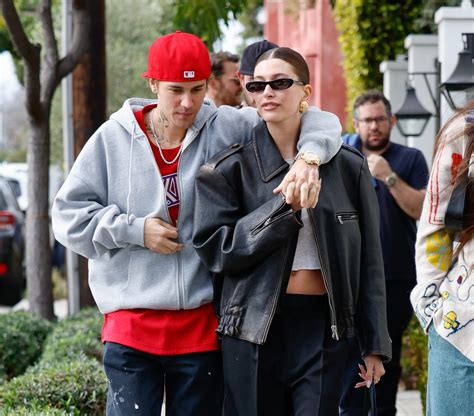 Hailey Bieber Accidentally Flashes Her Bare Stomach In Green Top On