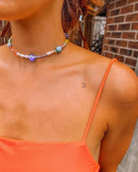 Minimalist Crescent Moon Tattoo On The Collarbone