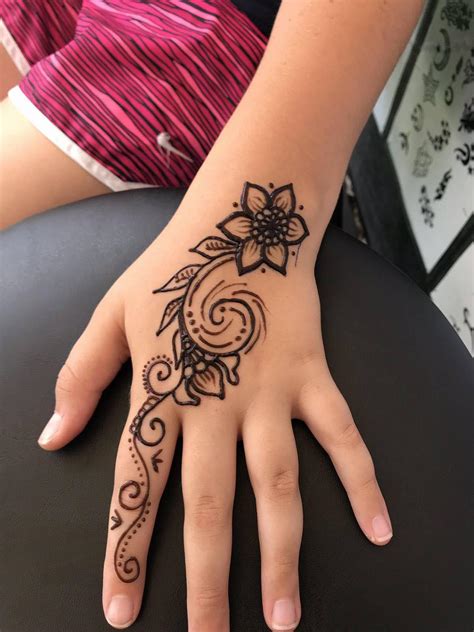 Flower Henna Hand Tattoos