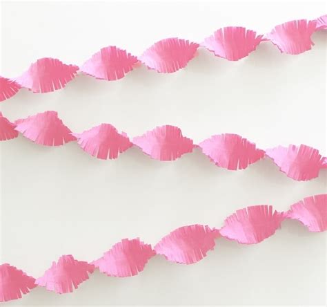 Guirnalda streamer papel crepé con flecos rizados azul claro