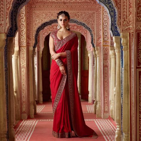 A Classic Red Sabyasachi Saree In Tussar Georgette With A Tilla Work